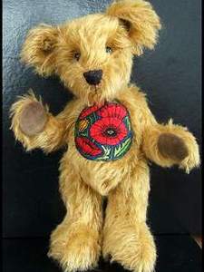A hand embroidered Poppy Bear by Bears of Bath - Bear Pile
