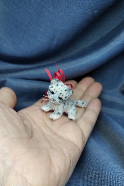 Miniature snow leopard Yuki by Marina Petrova - Bear Pile